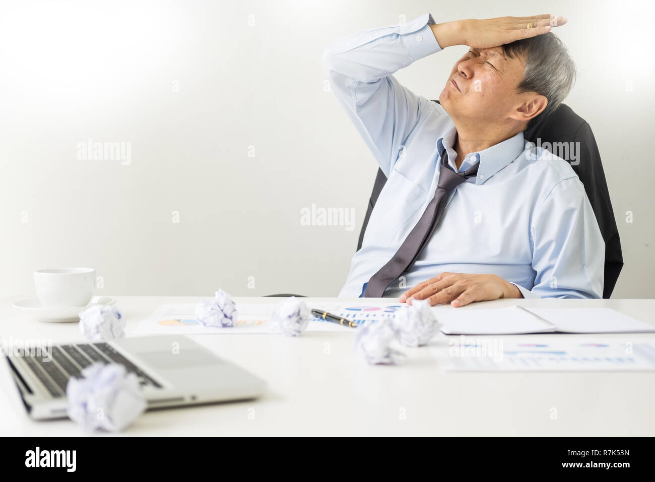 Depressed failure and tired businessman late sad and solving problem in ...