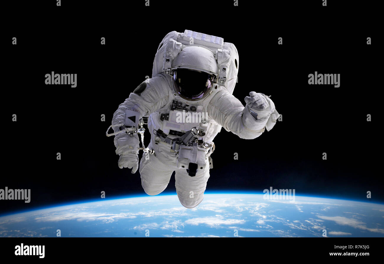 Astronaut waving in orbit hi-res stock photography and images - Alamy