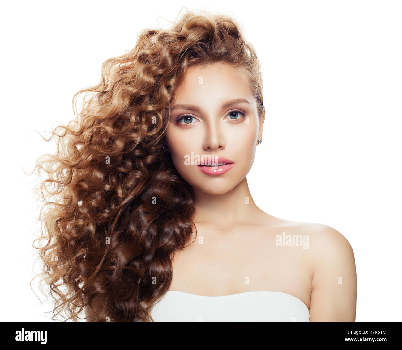 Young woman with wavy blonde hair isolated on white background Stock ...
