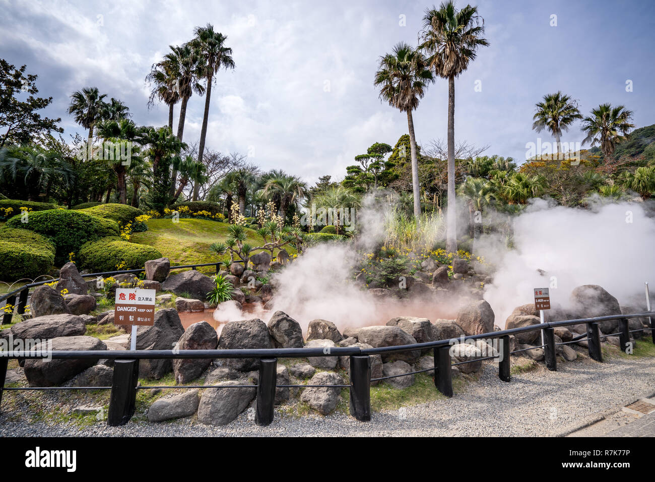 Red hot spring near UMI JIGOKU (Sea Hell) pond in autumn, which is one ...