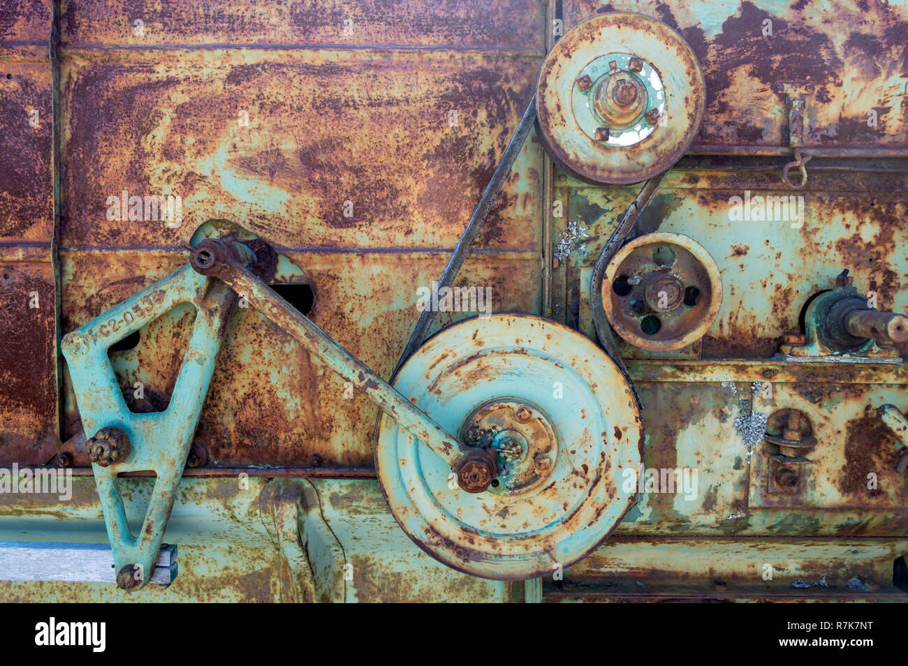 Rusty machine gears, pulleys, and belt Stock Photo - Alamy