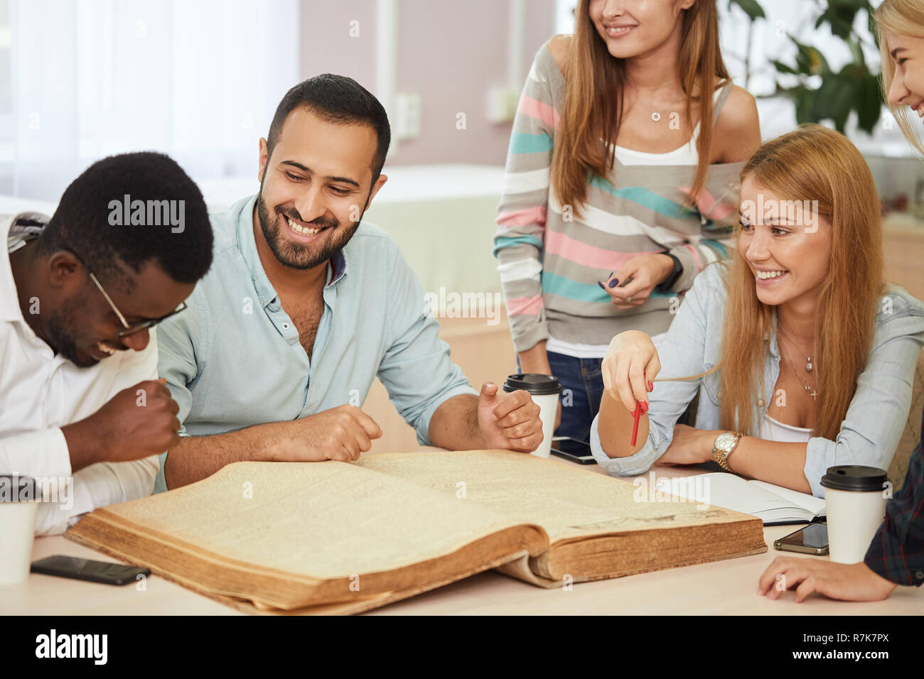 (four in library) studying and reading hi-res stock photography and ...