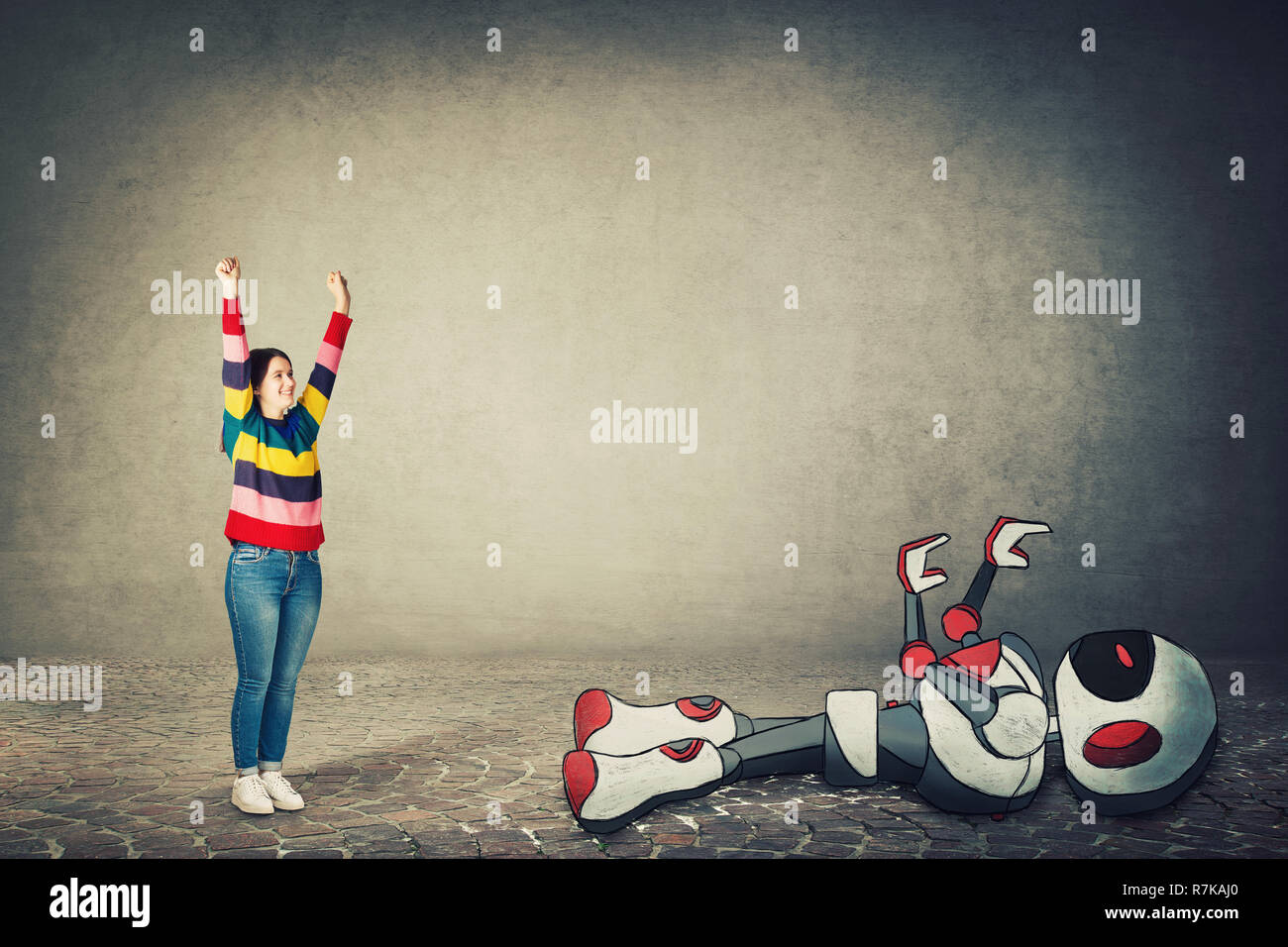 Casual young woman raising hands up celebrate winning after a fight ...