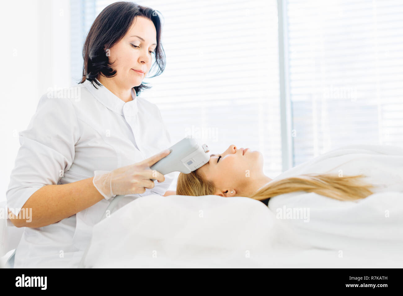 Non-surgical face lifting. SMAS lifting ultrasonic. Facelift Stock ...