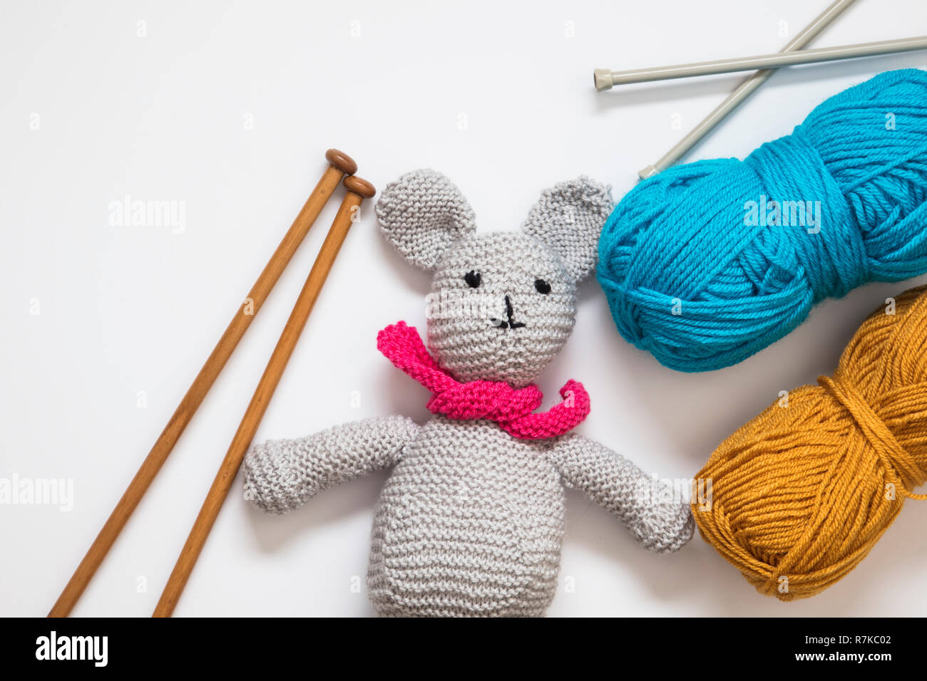 A handmade cute knitted rabbit toy for a child Stock Photo - Alamy