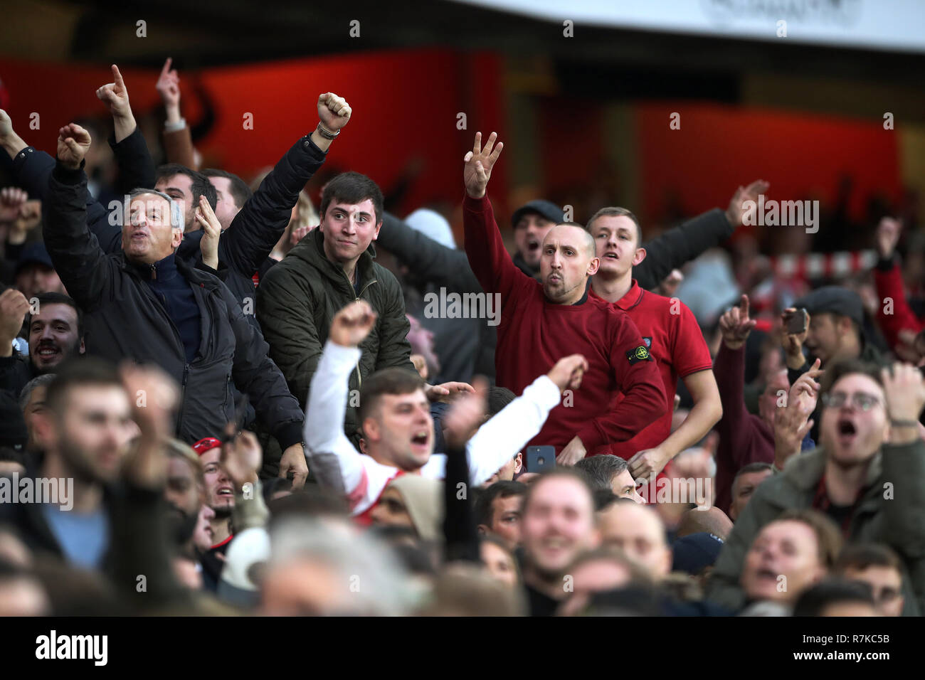 Arsenal fans show their support from the stands Stock Photo - Alamy