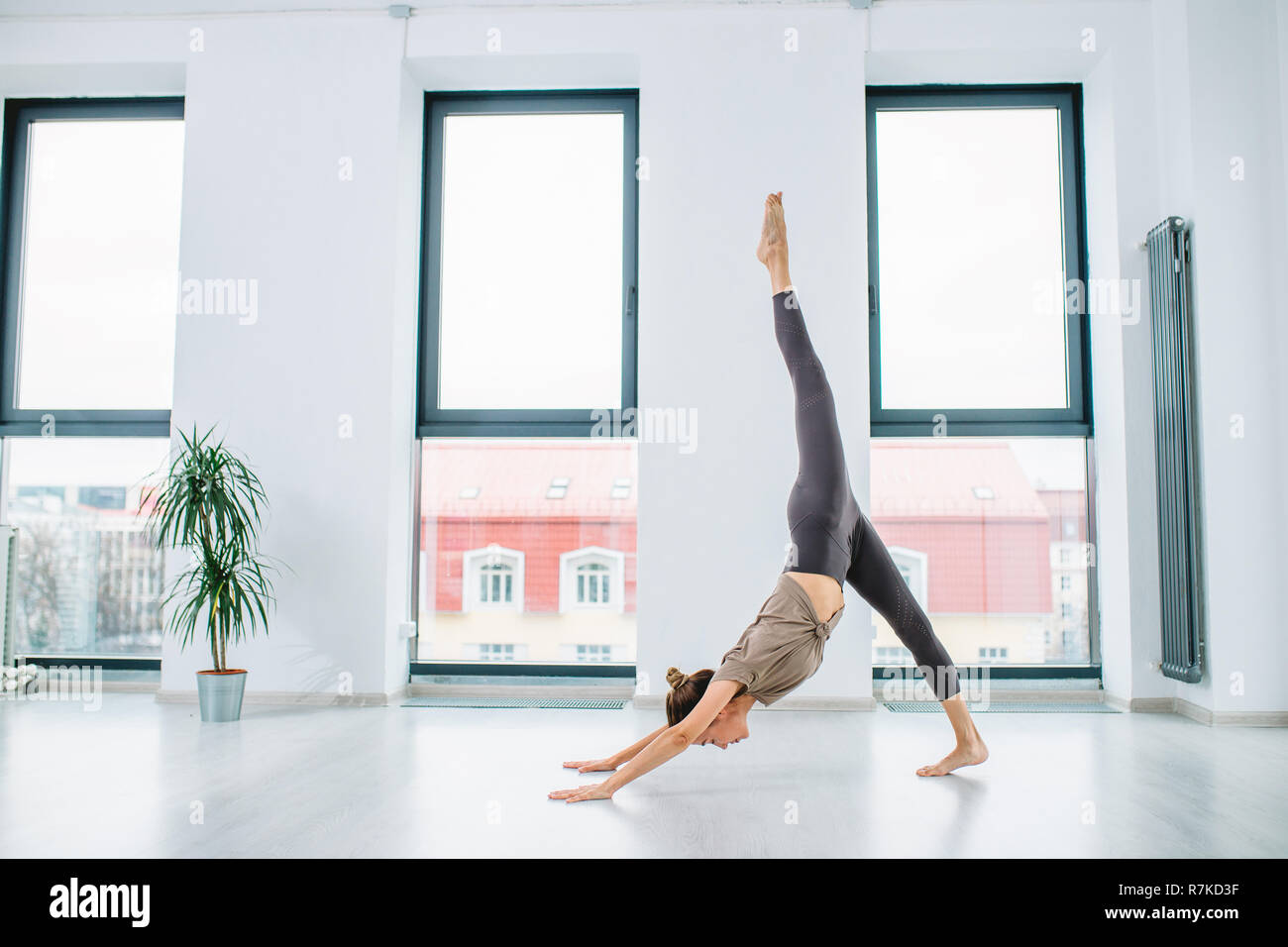 flexible girl doing a flip Stock Photo - Alamy