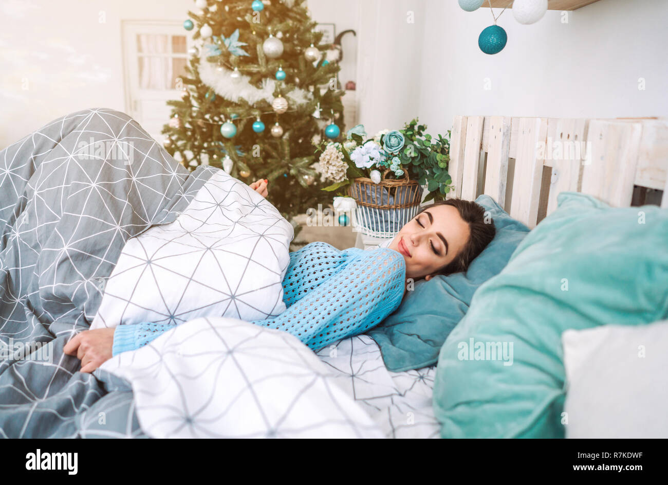 Young woman resting, sleeping in bed Stock Photo - Alamy