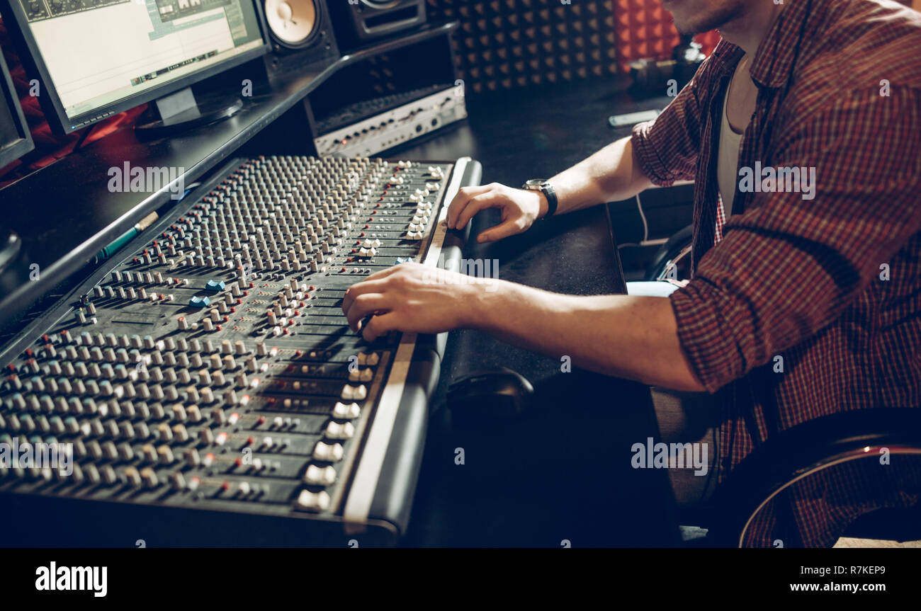 man is working with the mixing panel Stock Photo - Alamy