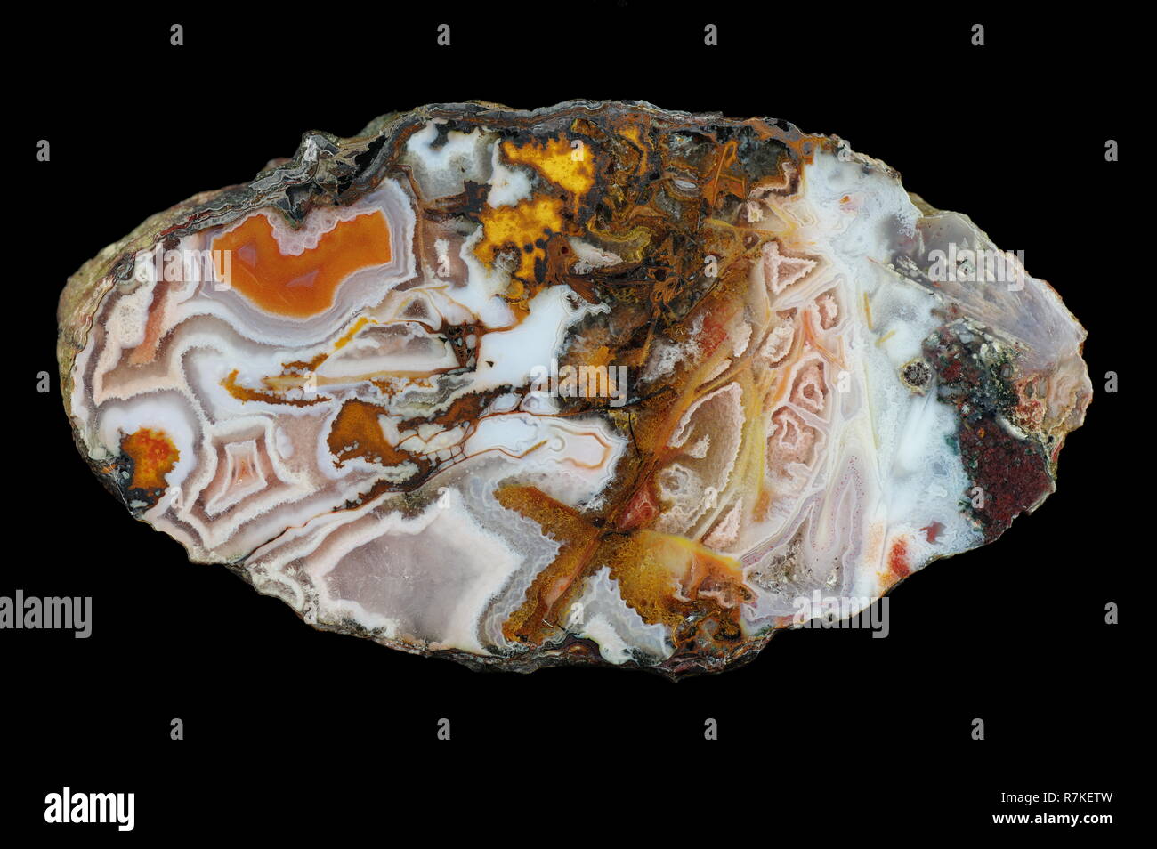 A cross-section of agate. Agates in agate - polycentric. White ...
