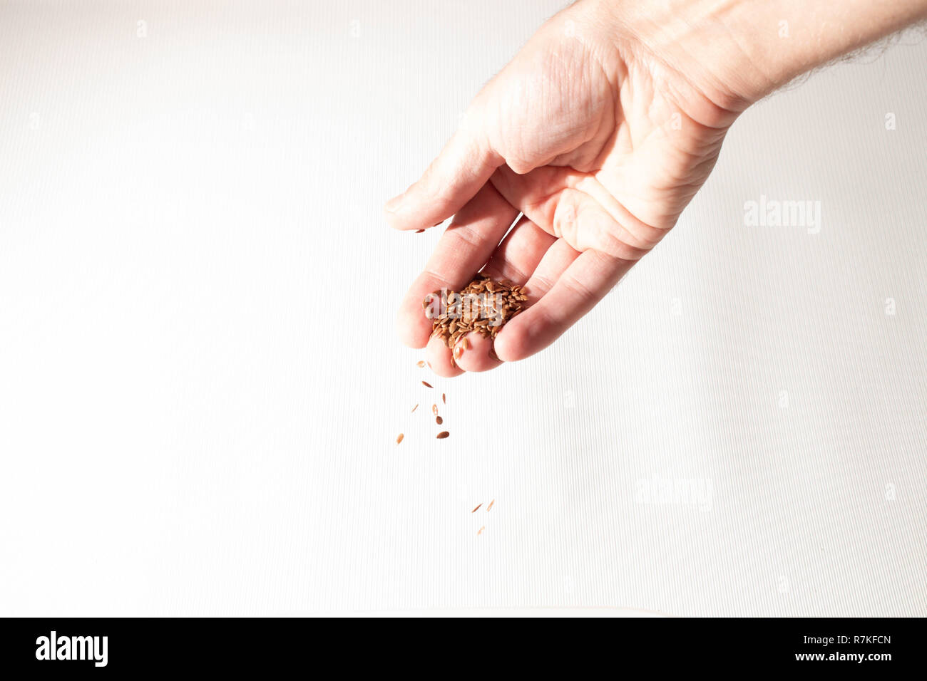 Flax seed hand hi-res stock photography and images - Alamy