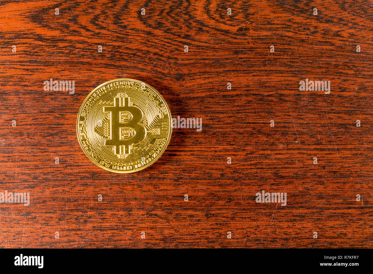 Bitcoin coin is small on a large background Stock Photo - Alamy