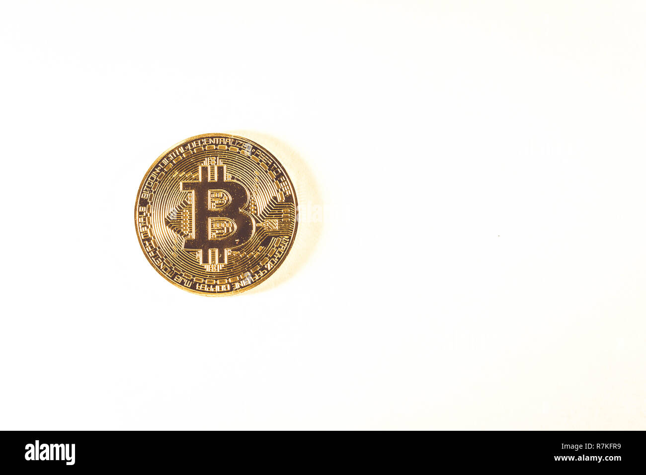 Bitcoin coin is small on a large background Stock Photo - Alamy