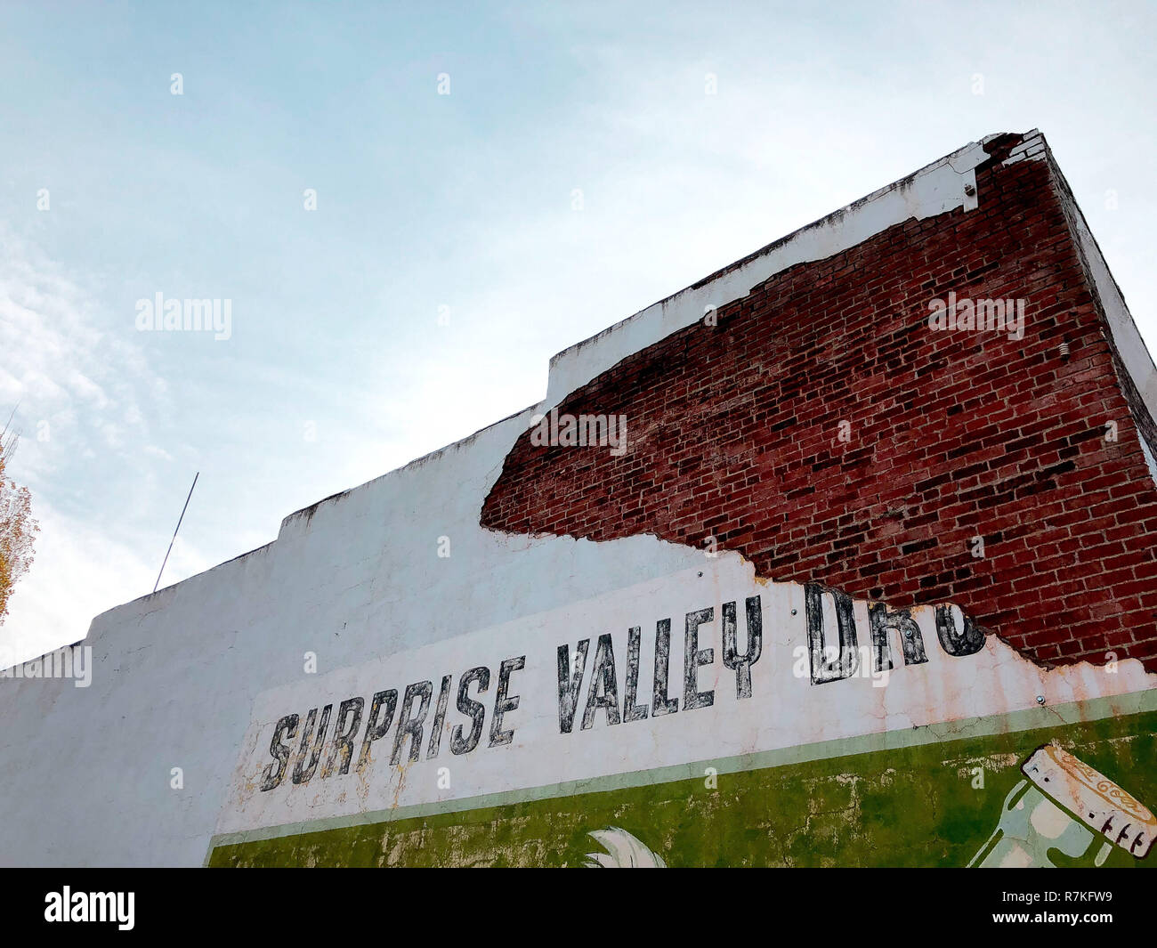 Ruined and decayed painted sign for Surprise Valley in Cedarville ...
