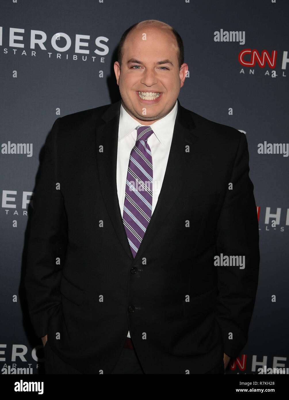 New York City, New York, USA. 9th Dec, 2018. News personality BRIAN STELTER attend the 12th ...