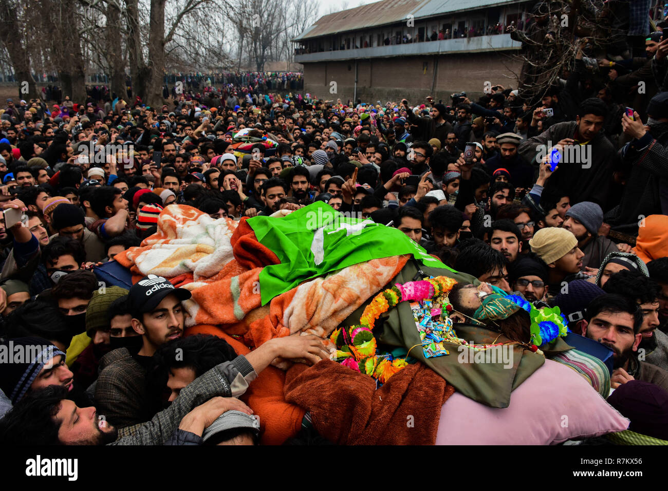 December 10, 2018 - Thousands of mourners carry the body of alleged rebels Mudasir Parray, 14 ...