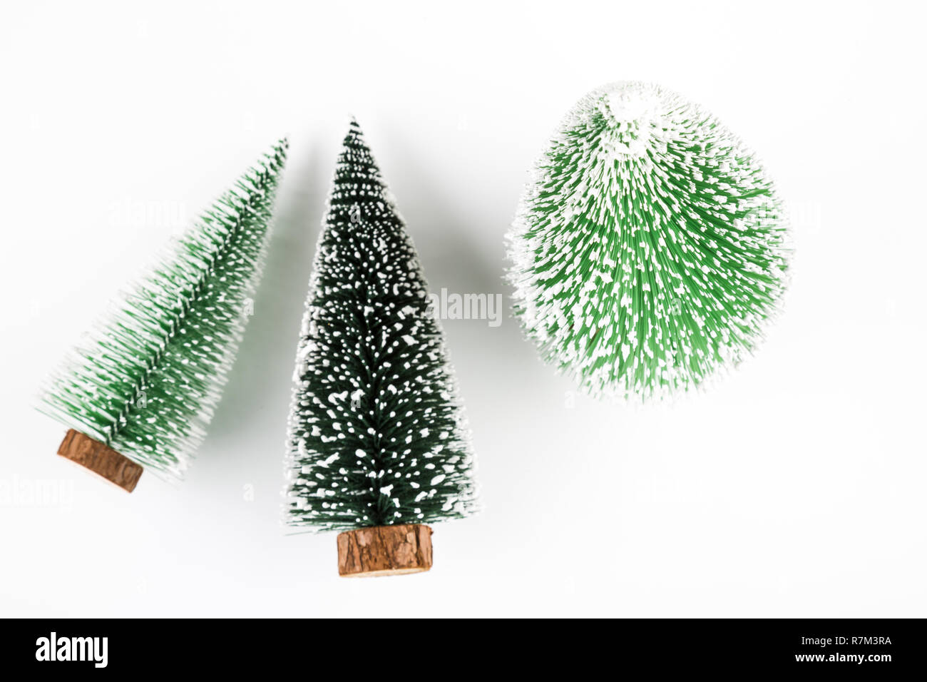 Top view of Christmas trees on white background Stock Photo - Alamy