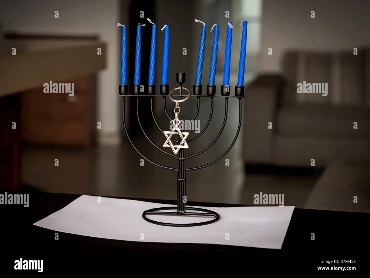 Traditional Jewish Chanukah Menorah candelabrum with eight blue candles ...