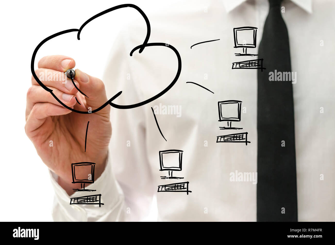 Male hand drawing cloud computing pictogram on a virtual interface with ...