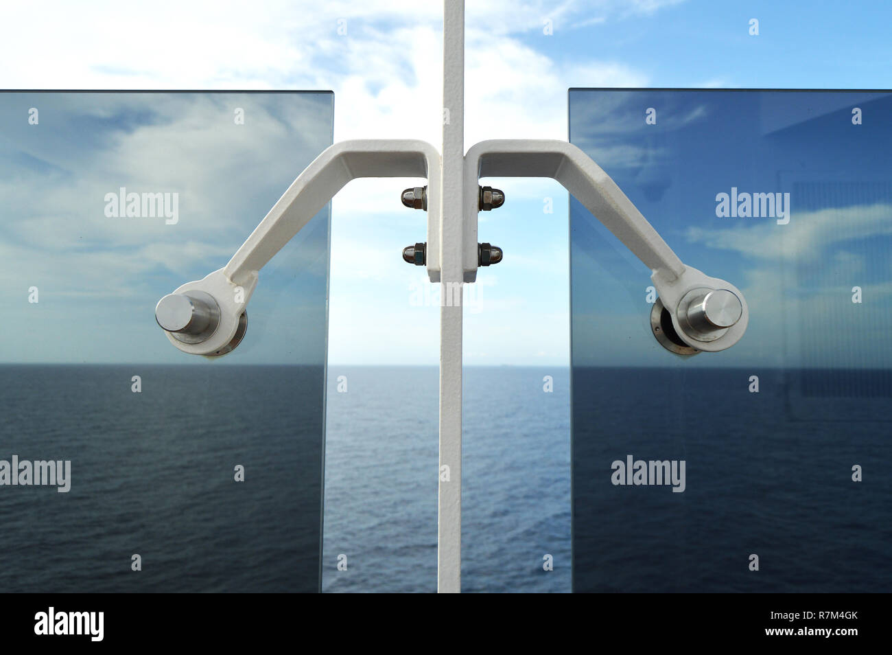 Sea view from the open deck of a modern cruise ship through a strong ...