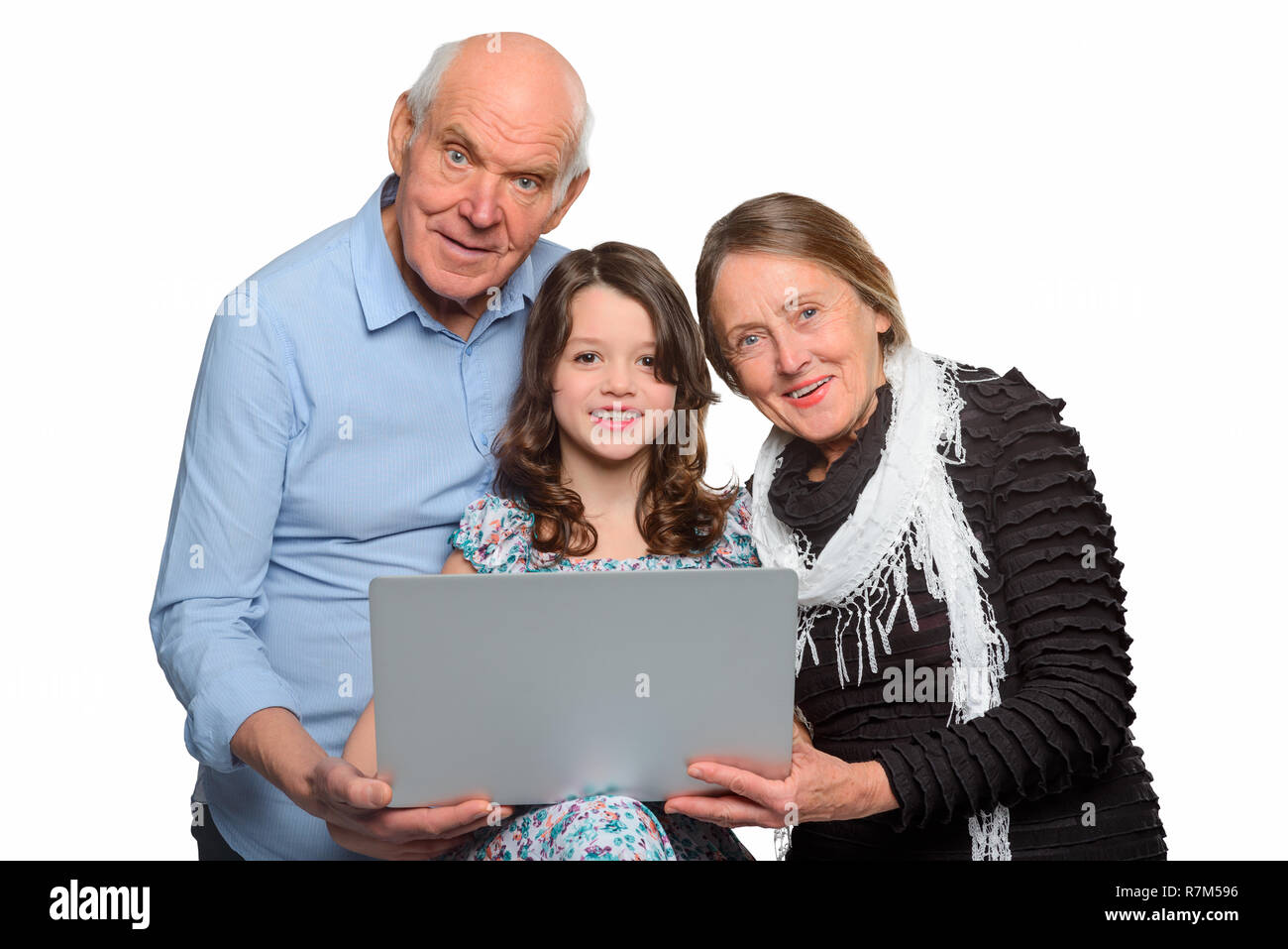 Family gathered around computer hi-res stock photography and images - Alamy