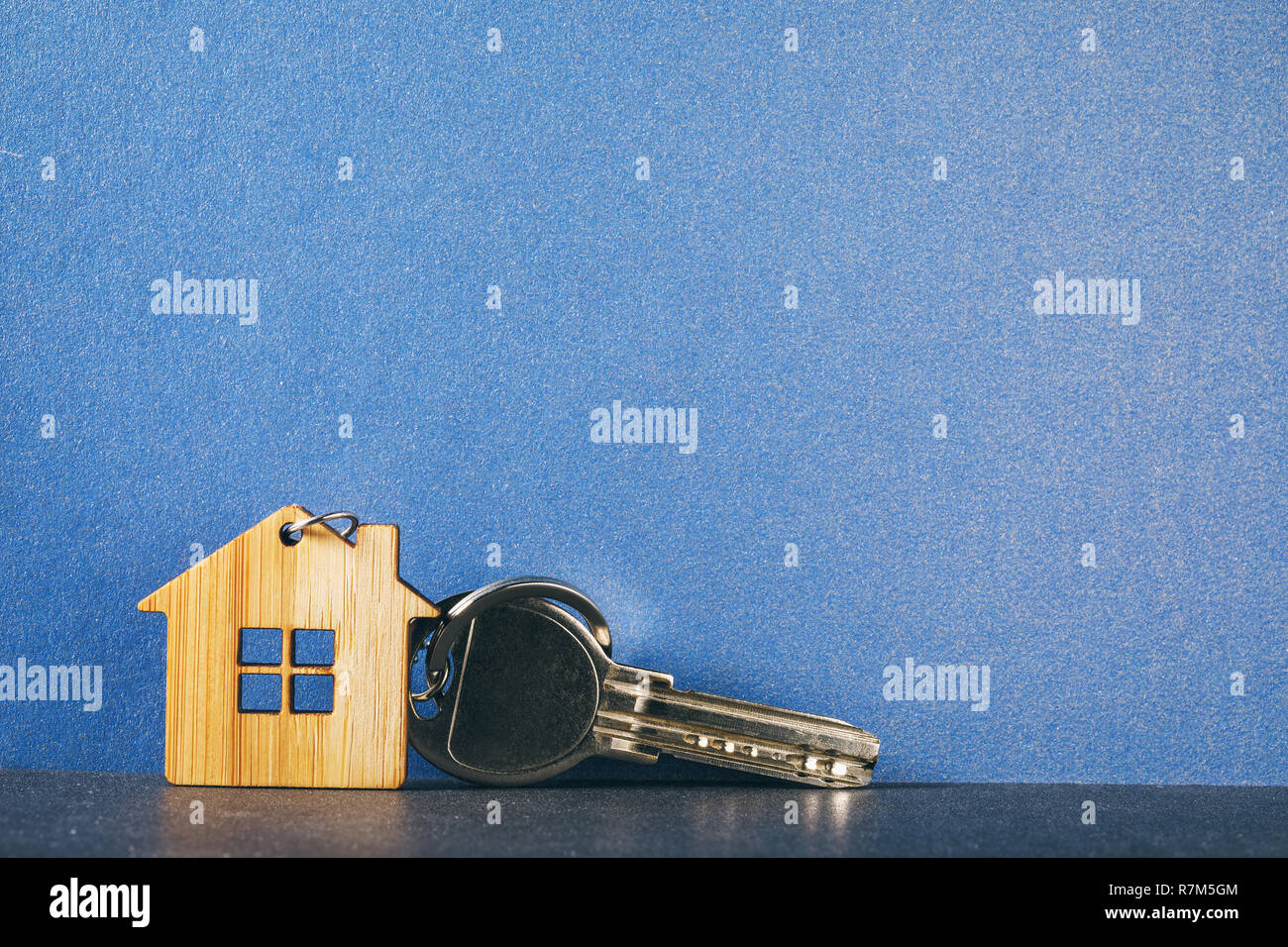 Apartment keys on a colored background with copy space Stock Photo - Alamy