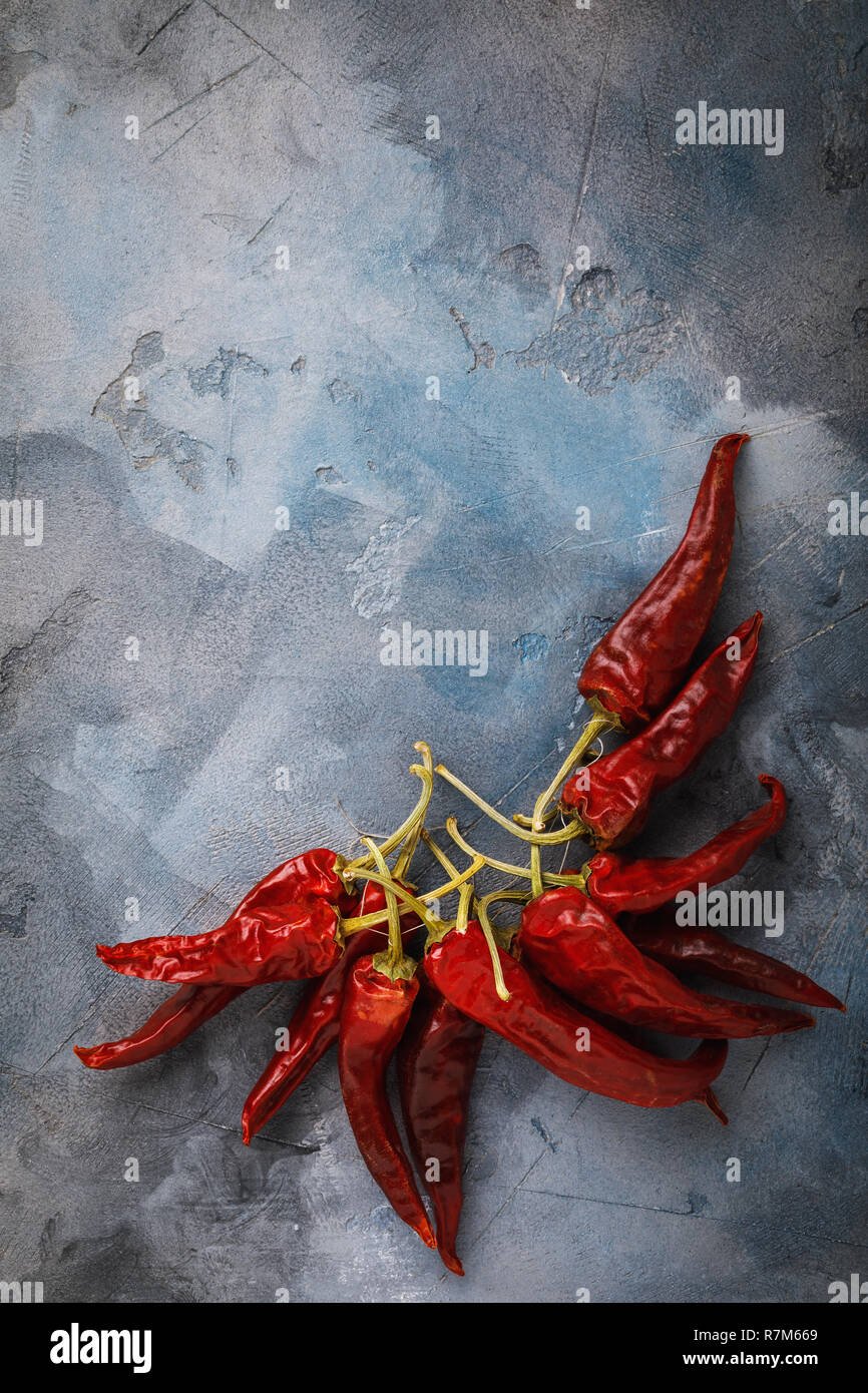 Bunch of dry red peppers on a table with copy space, top view Stock ...