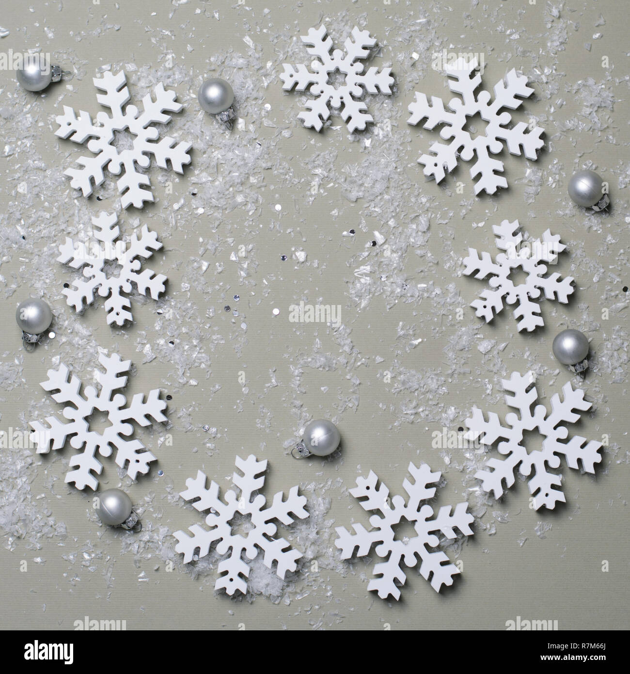 White Snowflakes on Beige Background, Winter Concept, Top View Stock ...