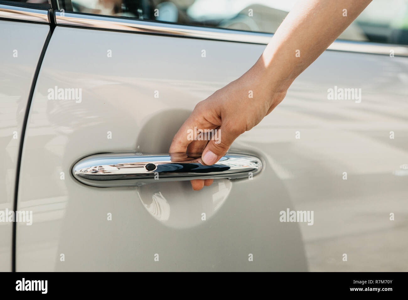 Car door open person hi-res stock photography and images - Alamy