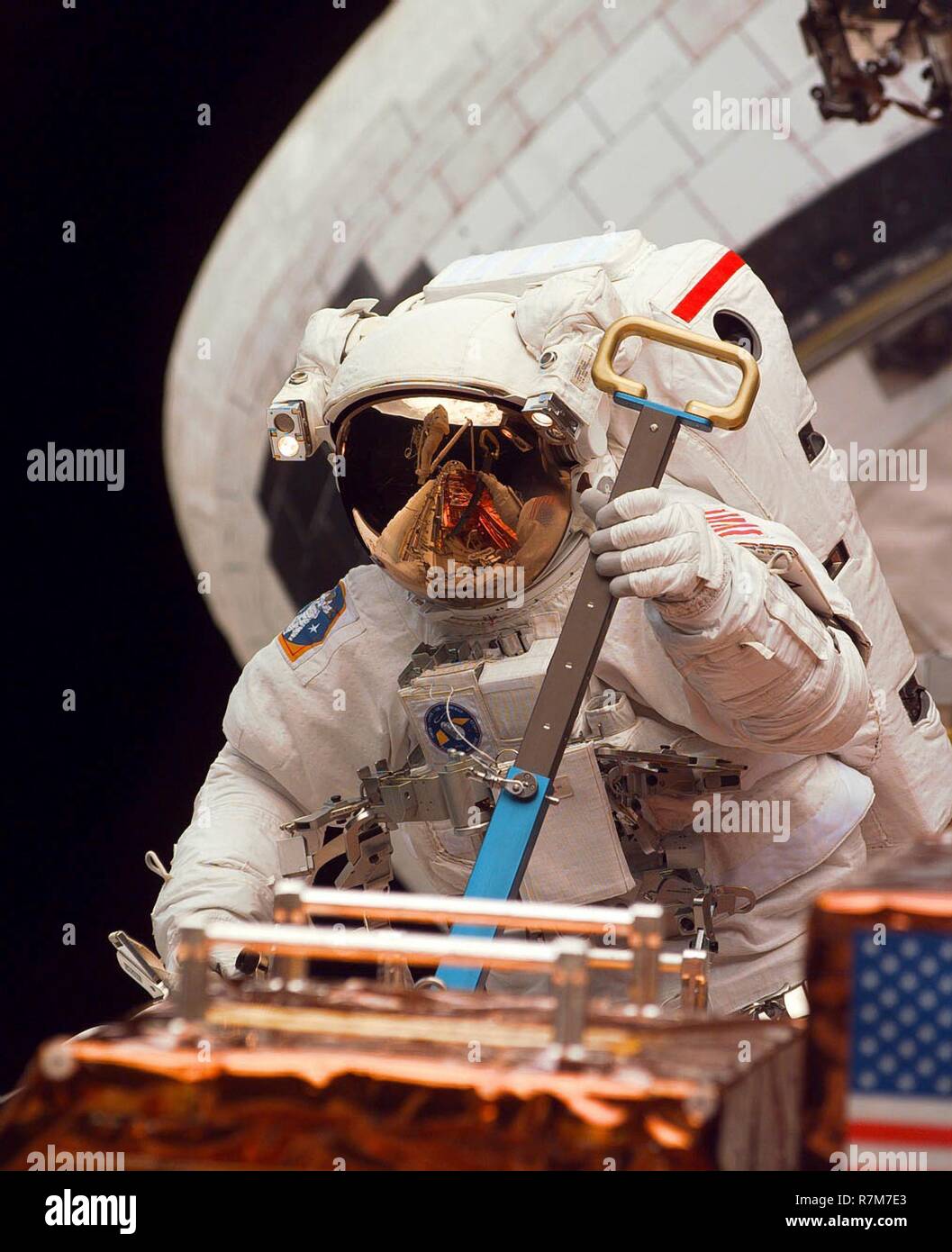 American astronaut Mark C. Lee works on maintenance and upgrading of ...