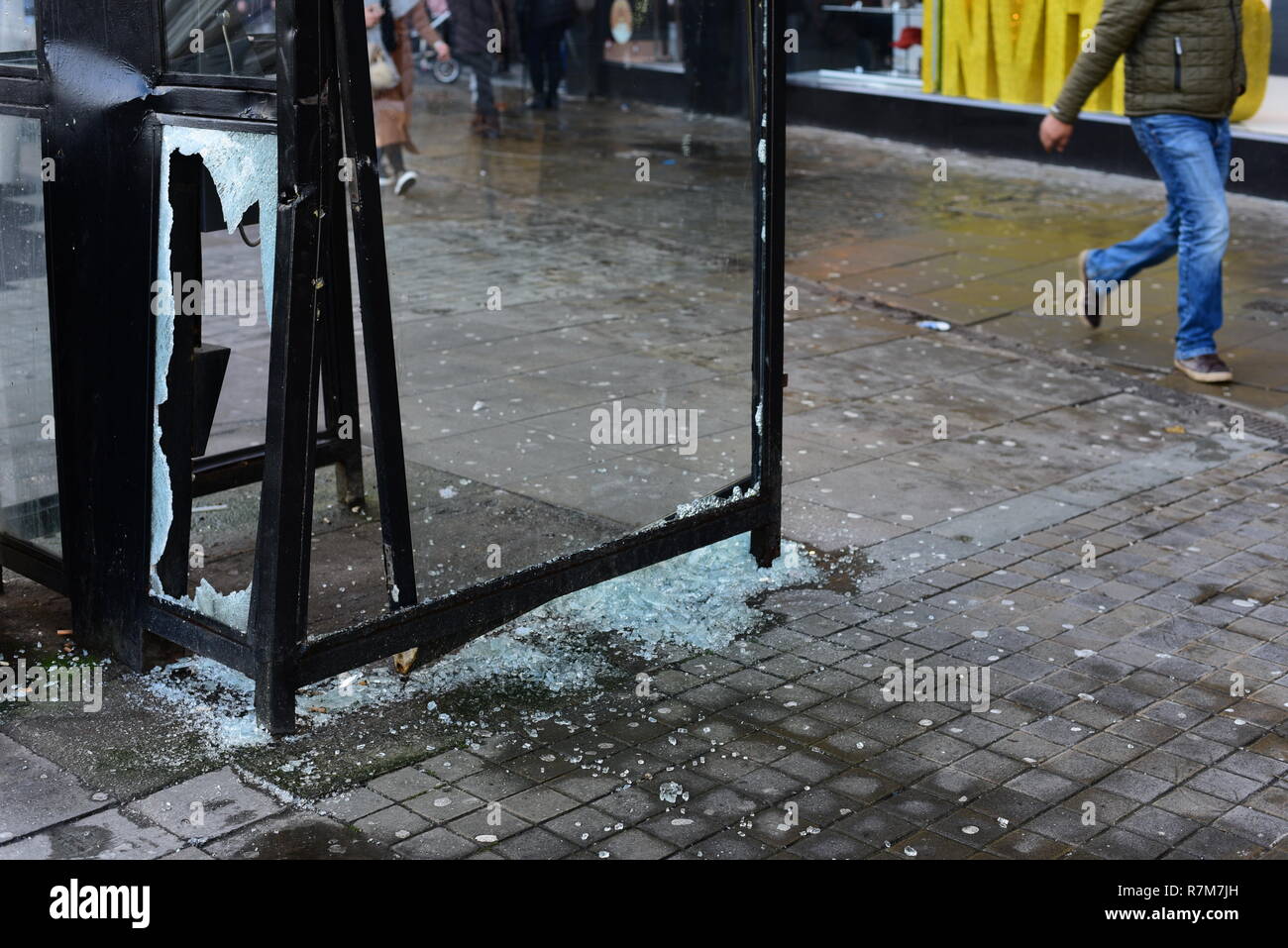 Damaged telephone box Stock Photo - Alamy