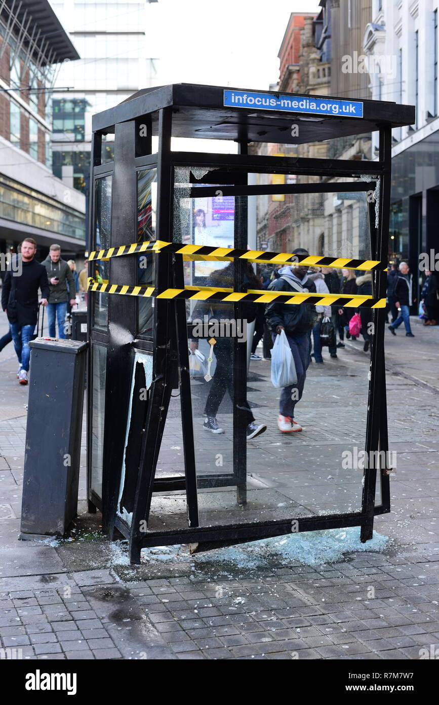 Damaged telephone box Stock Photo - Alamy