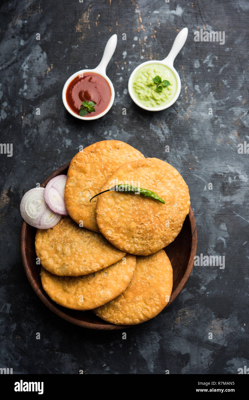 Shegaon or Rajasthani Kachori served with green Chutney and tomato ...