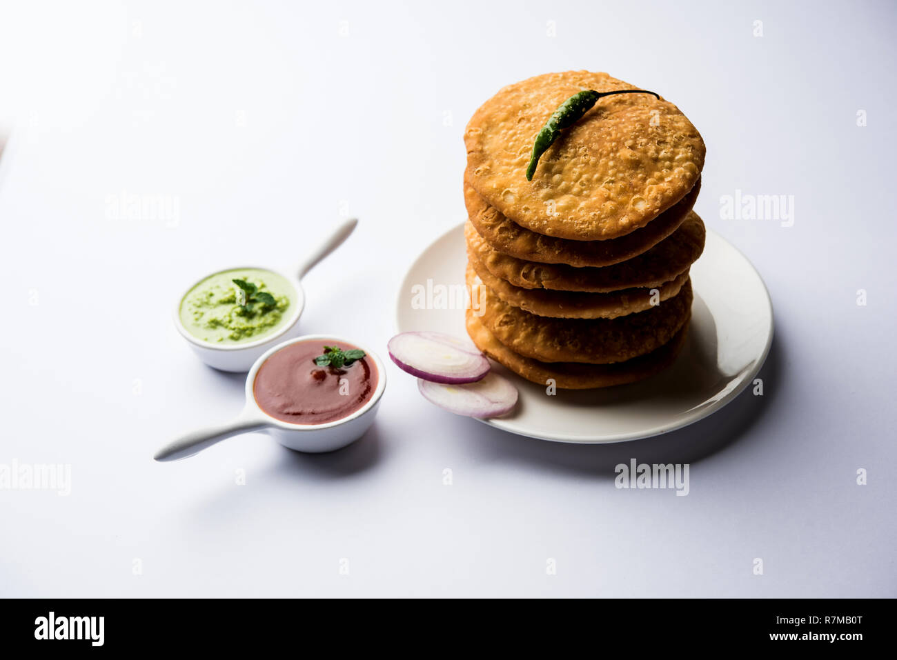 Shegaon or Rajasthani Kachori served with green Chutney and tomato ...