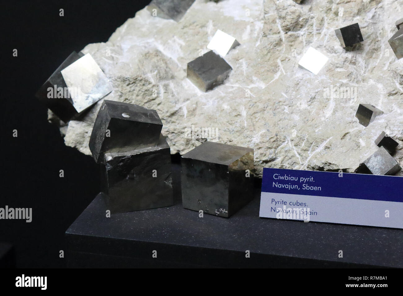 Iron pyrite cubes inside a white rock with the typical perfect ...