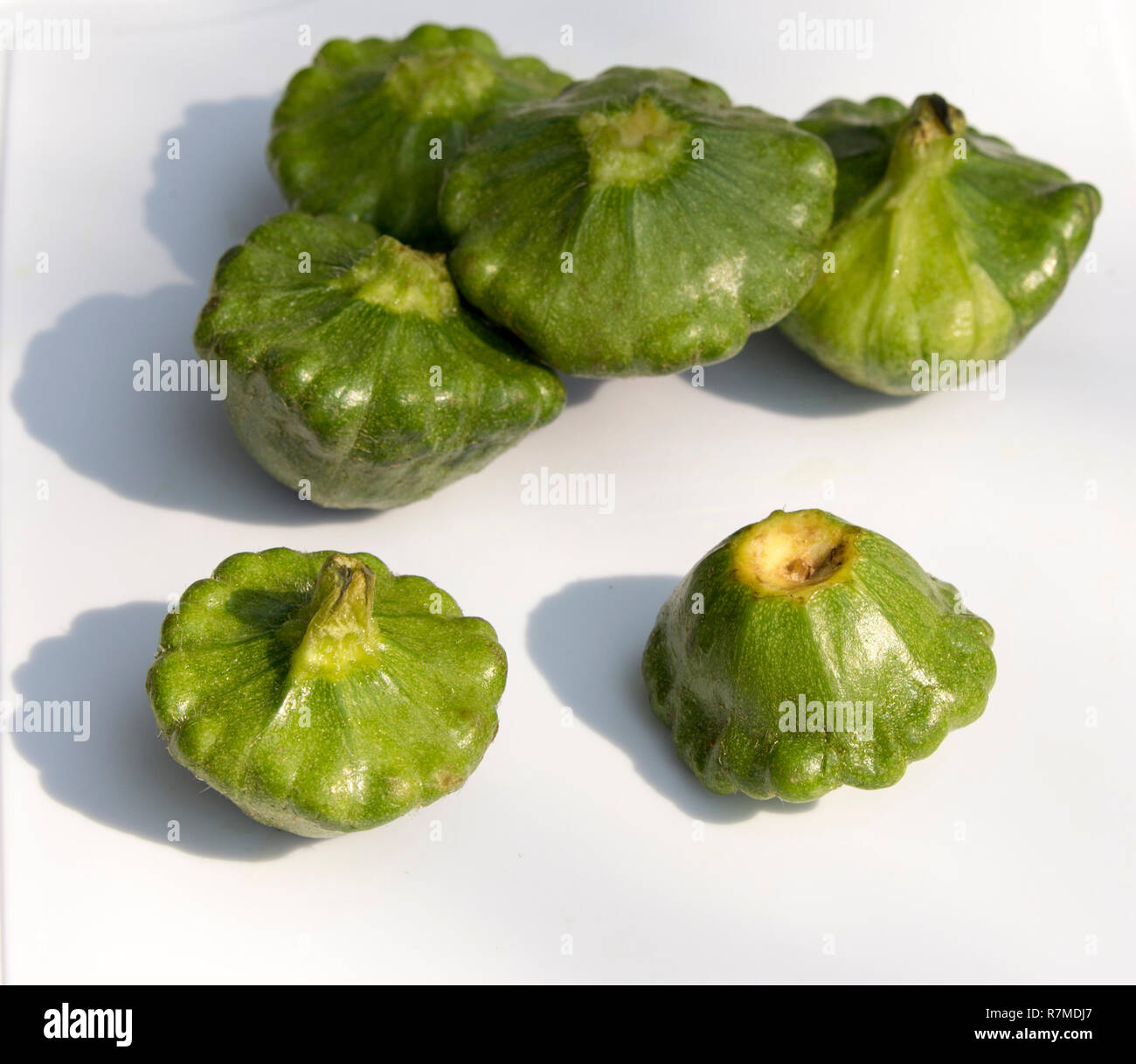 pattipan vegetable close up on white background Stock Photo - Alamy