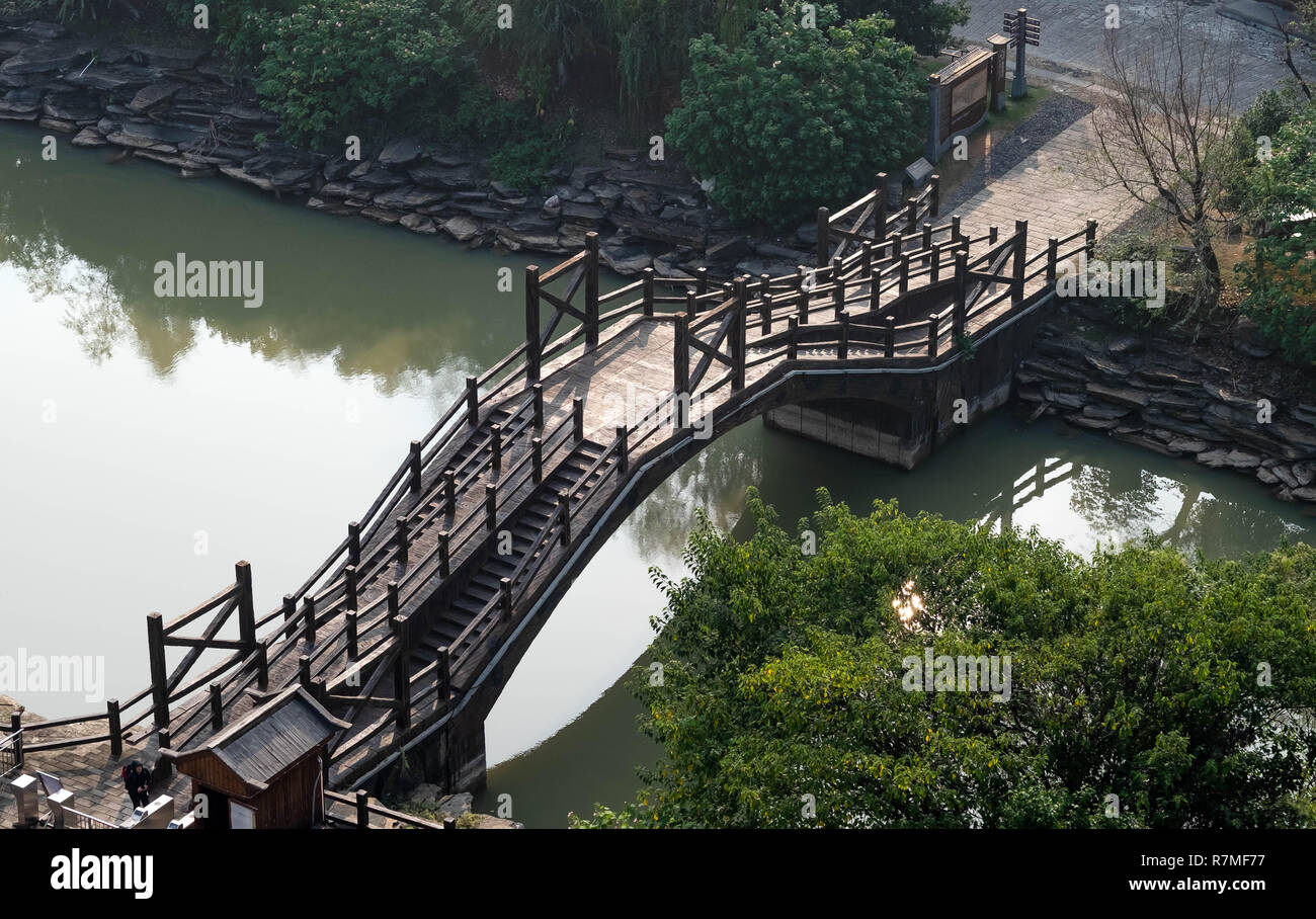 View from the top of fortress. Chinese bridge on a calm canal. At Chibi ...