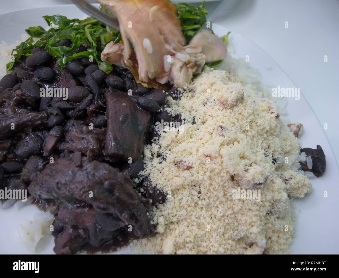 Brazilian national dish 'feijoada', stew made with black beans and pork ...