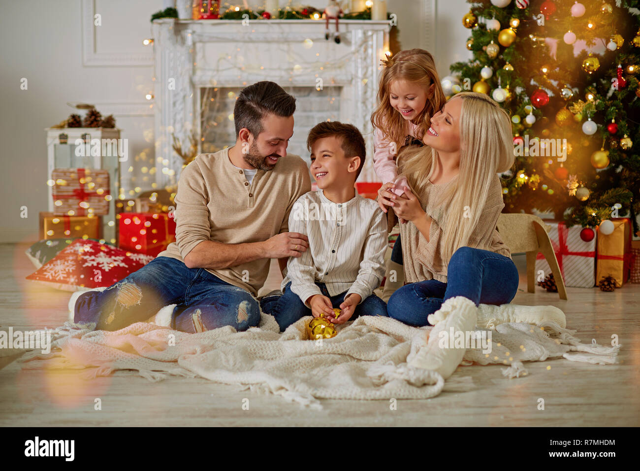Home happy family christmas tree hi-res stock photography and images ...