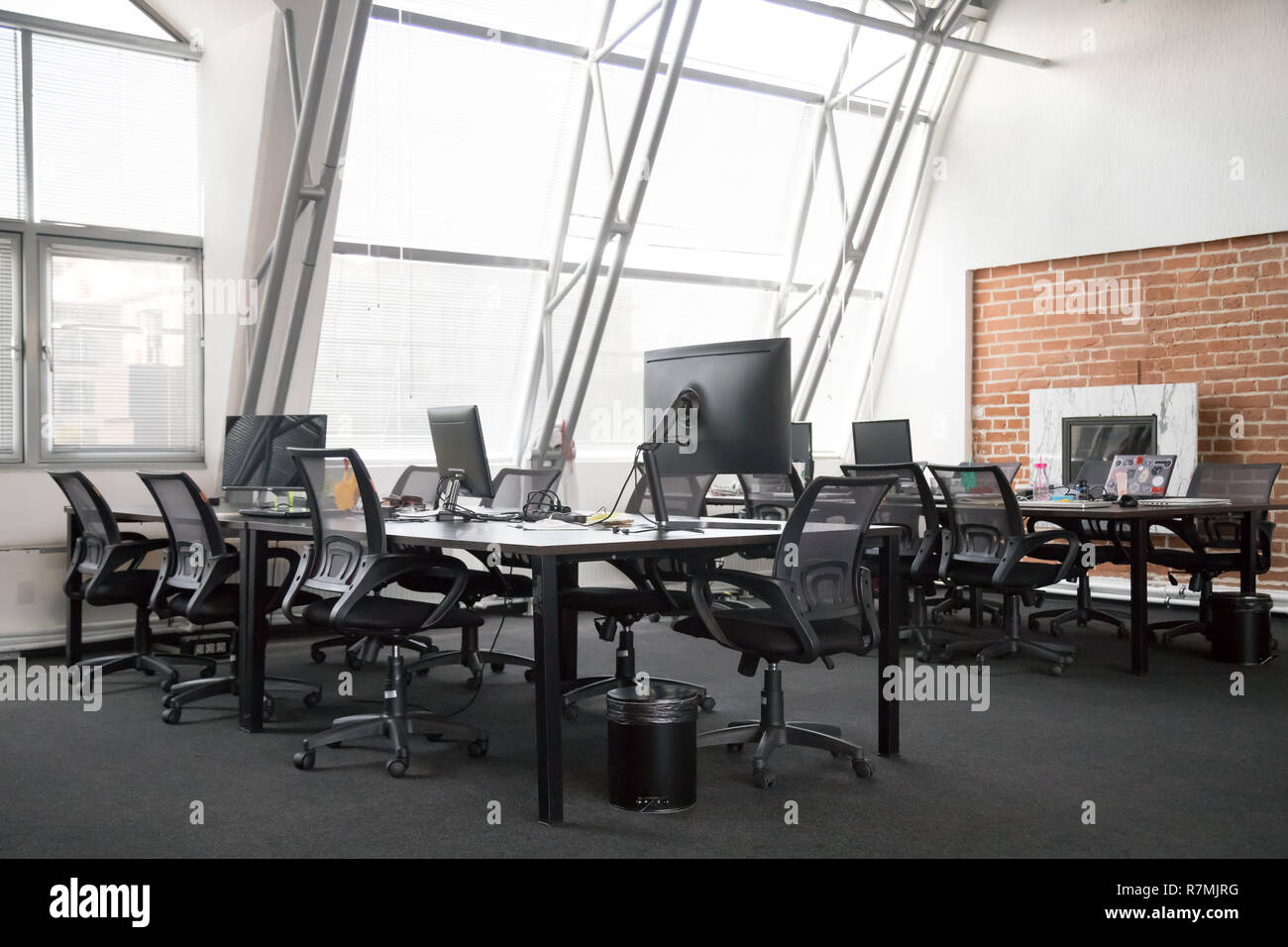 Modern view of empty office space interior Stock Photo - Alamy