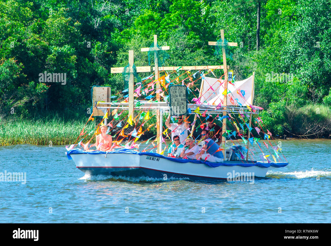 A decorated shrimp boat travels down the bayou during the 66th annual ...