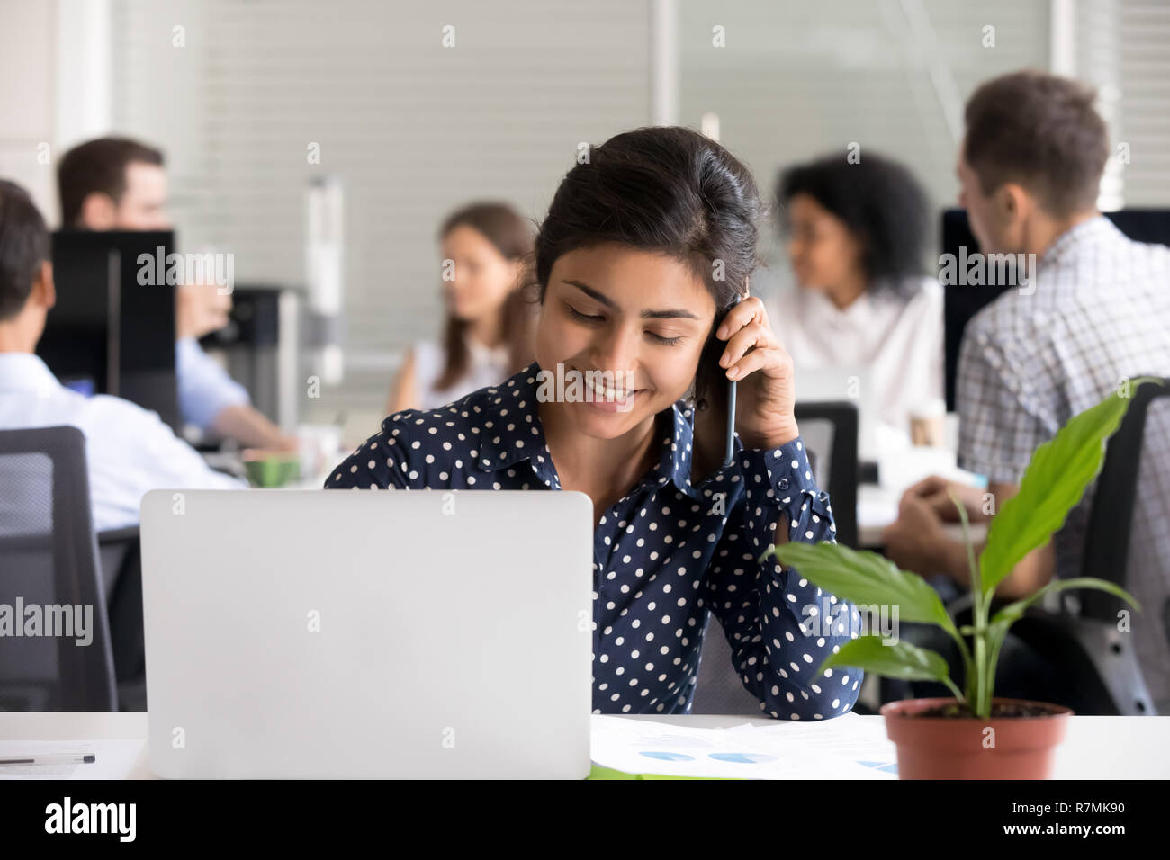 Cheerful indian woman using smartphone hi-res stock photography and ...