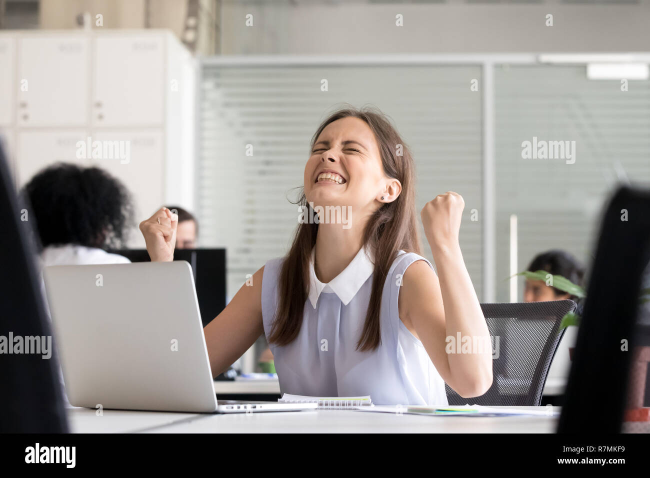Excited young girl celebrating success achievement result Stock Photo ...