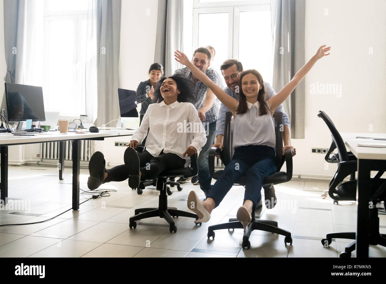 Happy multiracial colleagues group having fun together in office Stock ...