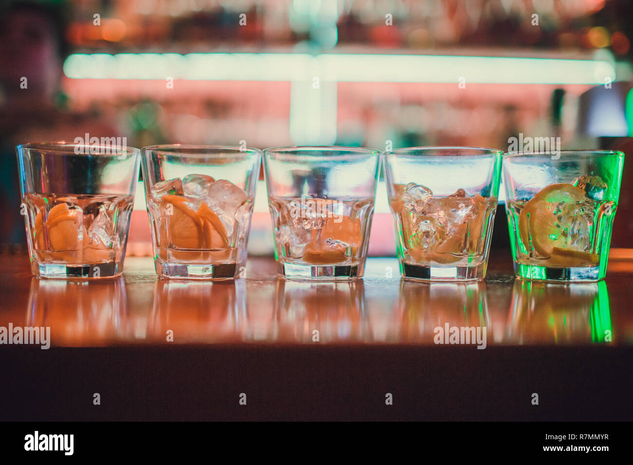 Multicolored alcoholic shots on the bar counter Stock Photo - Alamy