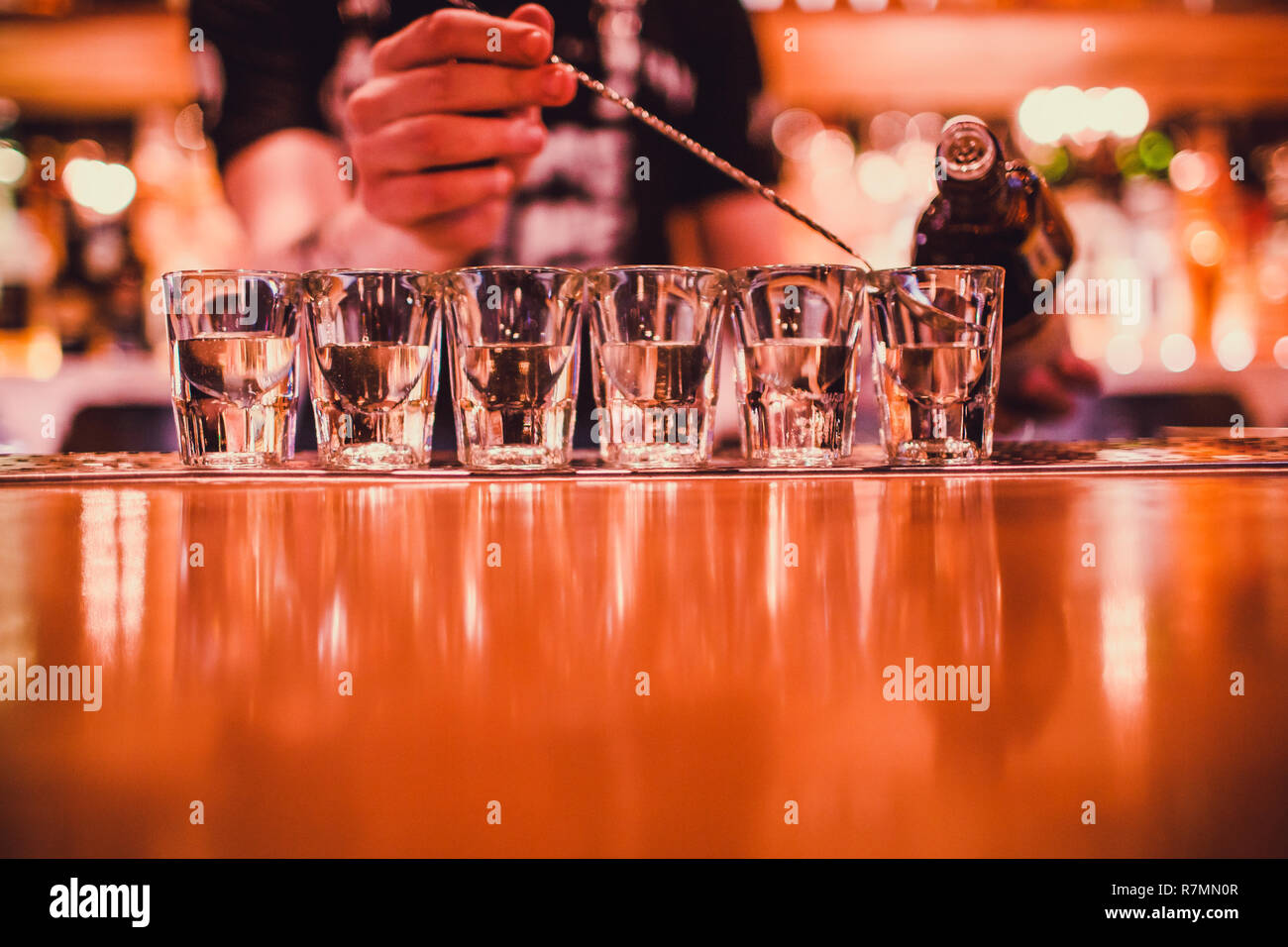 Multicolored alcoholic shots on the bar counter Stock Photo - Alamy