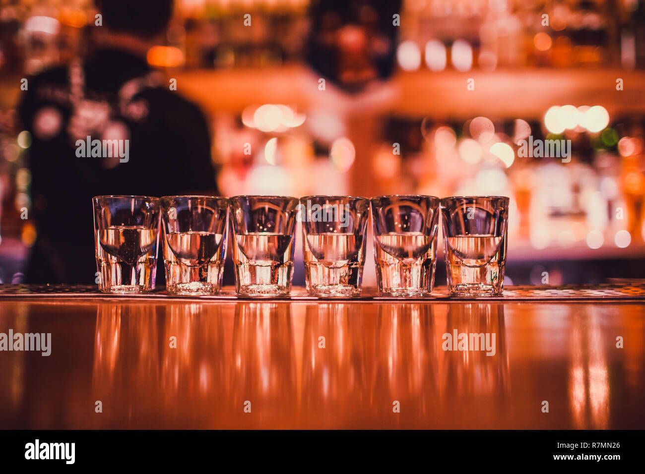 Multicolored alcoholic shots on the bar counter Stock Photo - Alamy
