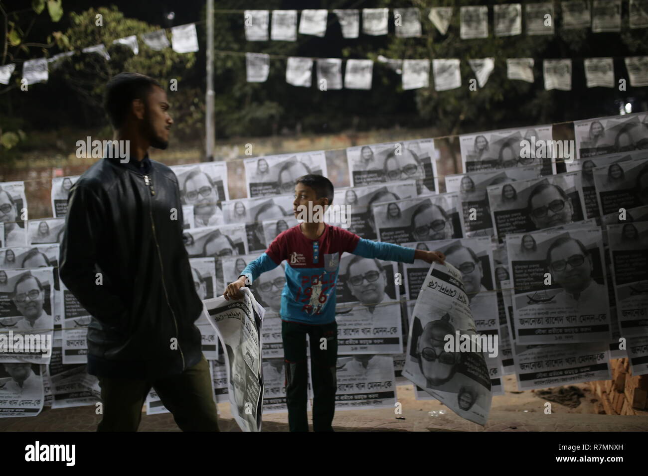 Bangladeshi boys decorate posters of Bangladesh Awami League’s MP ...