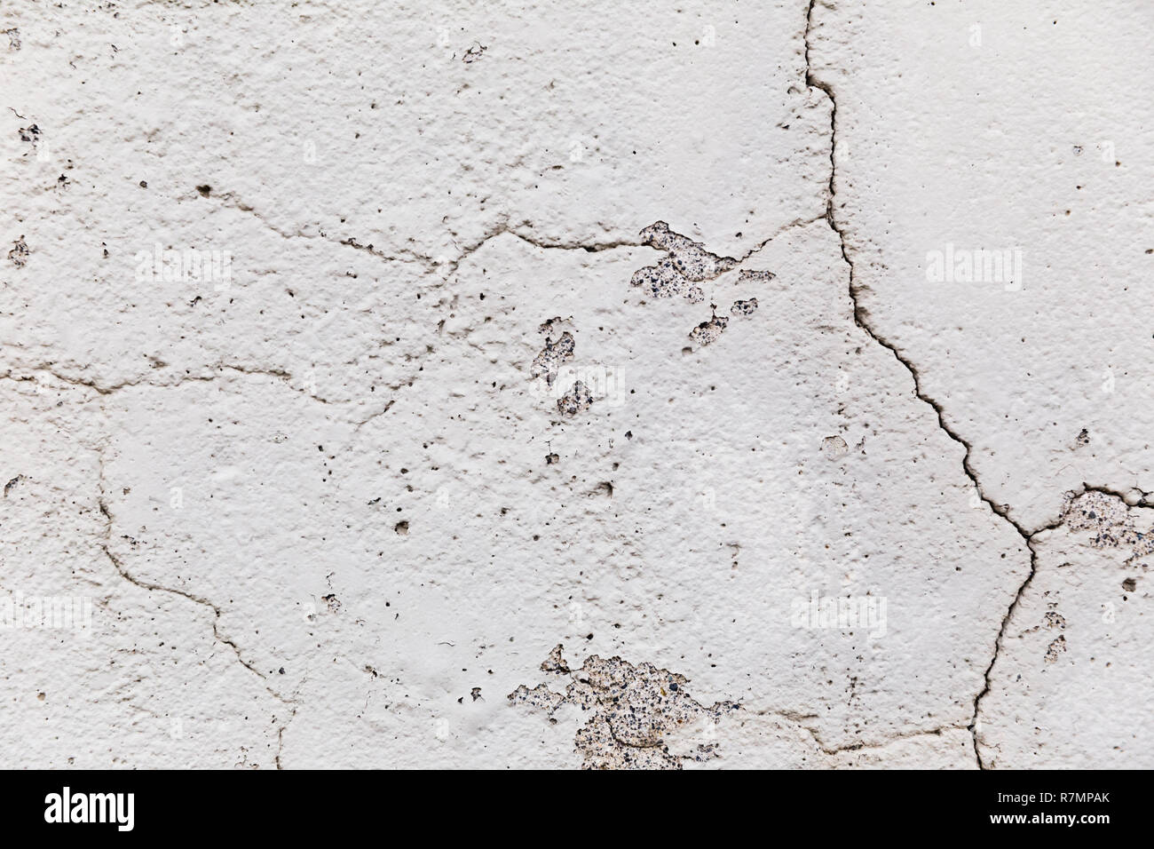 Close up details of old stone wall surface with bumps and cracks Stock ...