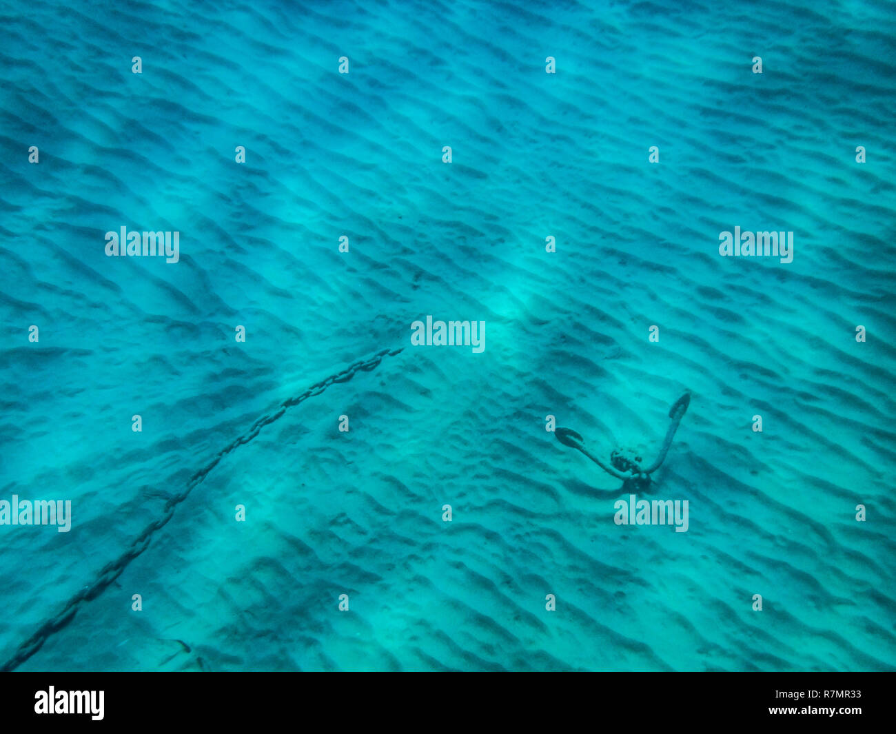 Anchor in sea Stock Photo - Alamy